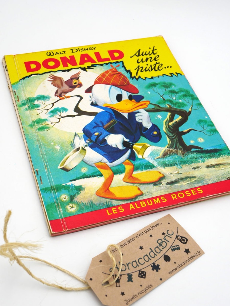 Donald suit une piste - ALBUMS ROSES | Abracadabric